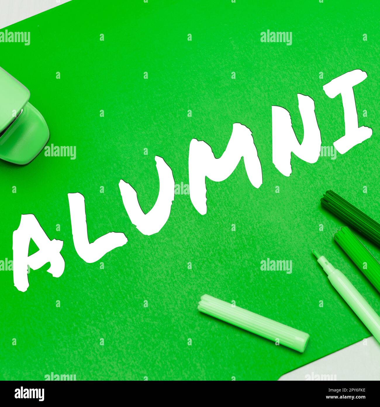 Sign displaying Alumni, Business idea former pupil or student ...