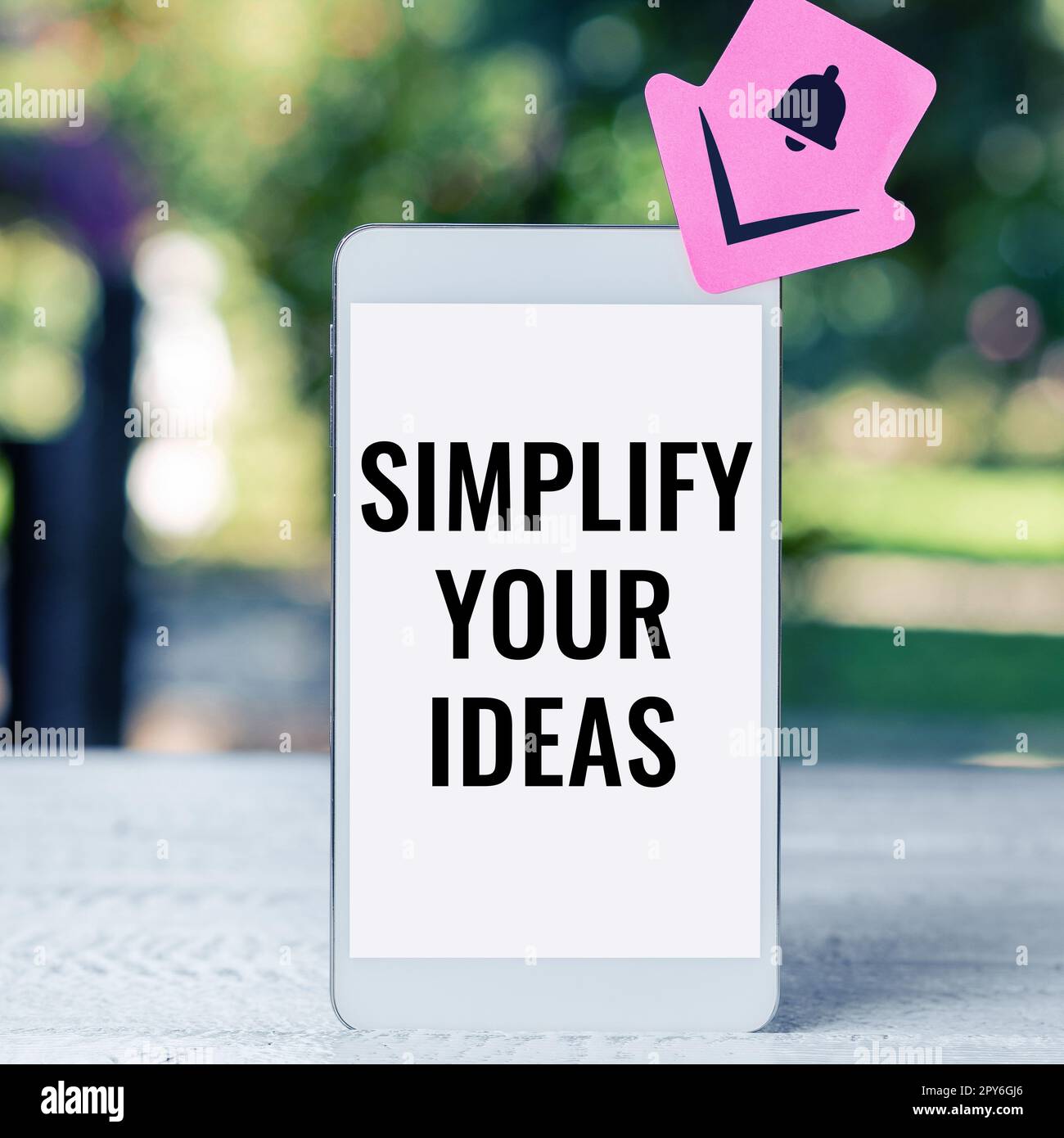 Hand writing sign Simplify Your Ideas. Concept meaning make simple or ...