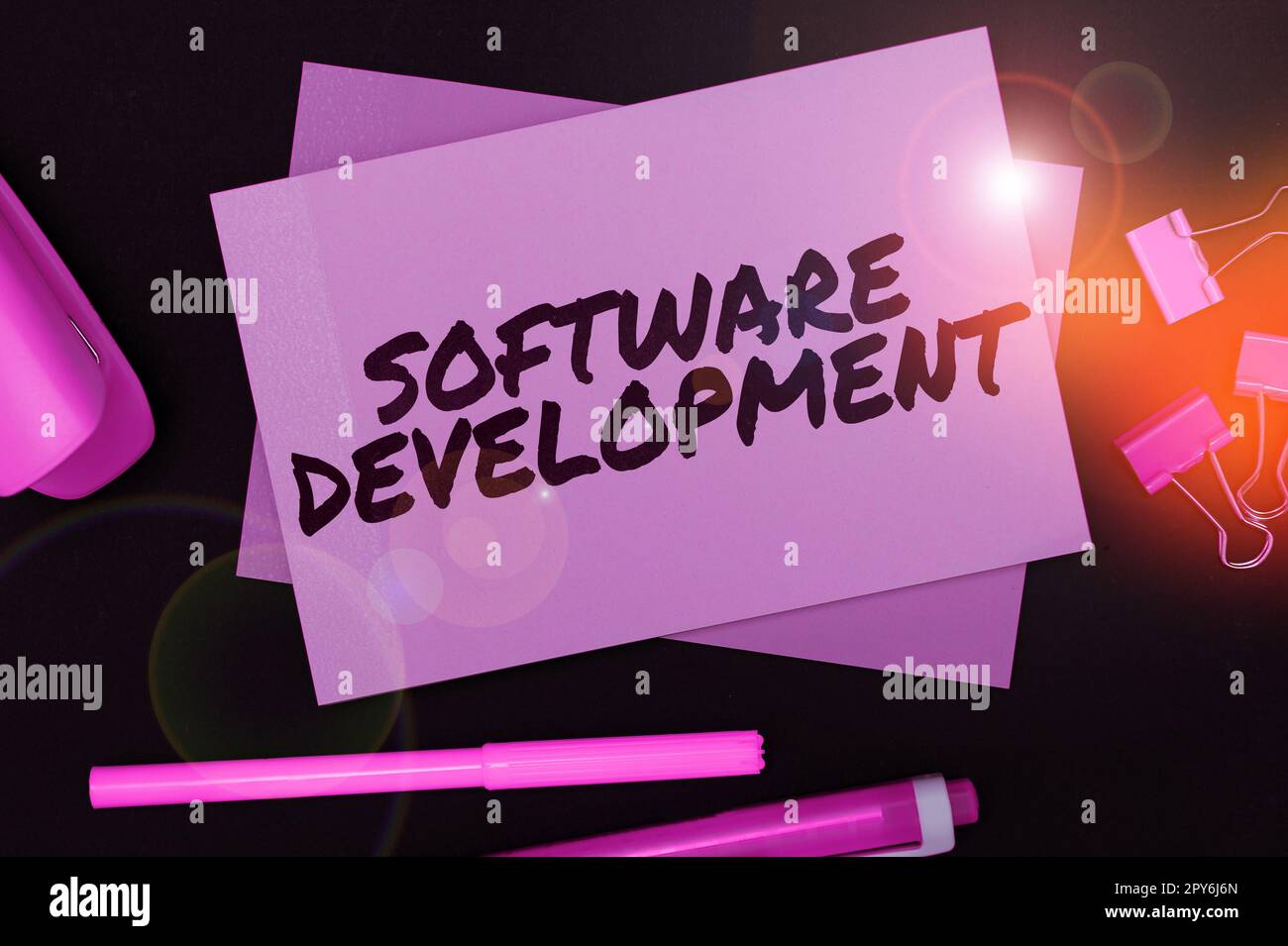 Hand writing sign Software Development. Word Written on software is ...