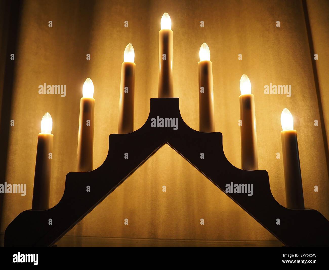 Schwibbogen arch luminaire in the form of a triangular candlestick ...