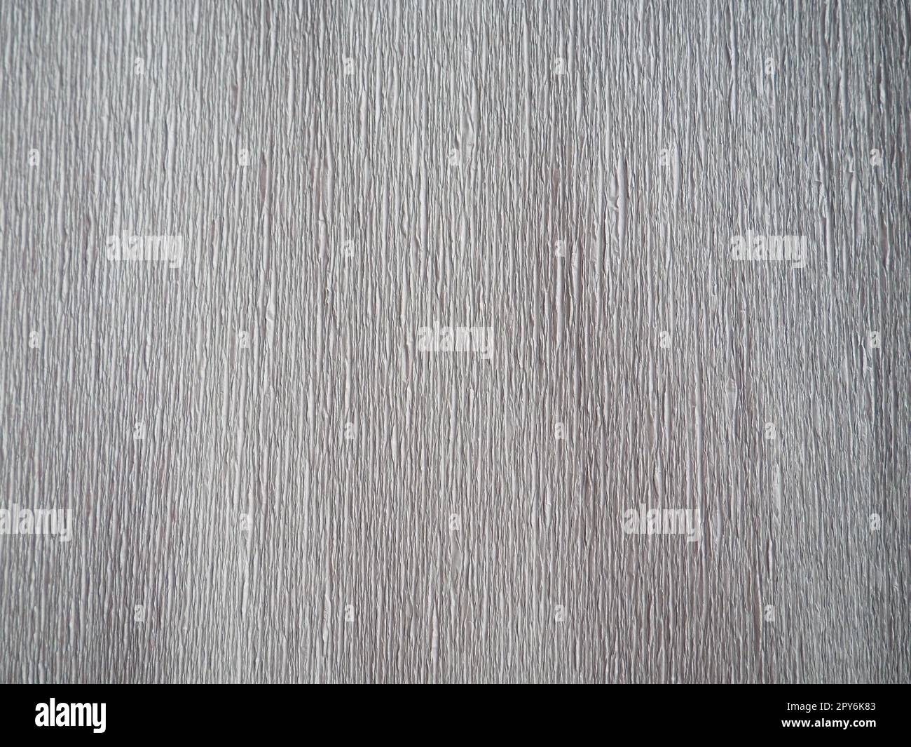 Gray corrugated paper. Uneven surface. Abstract background. Wavy edges ...
