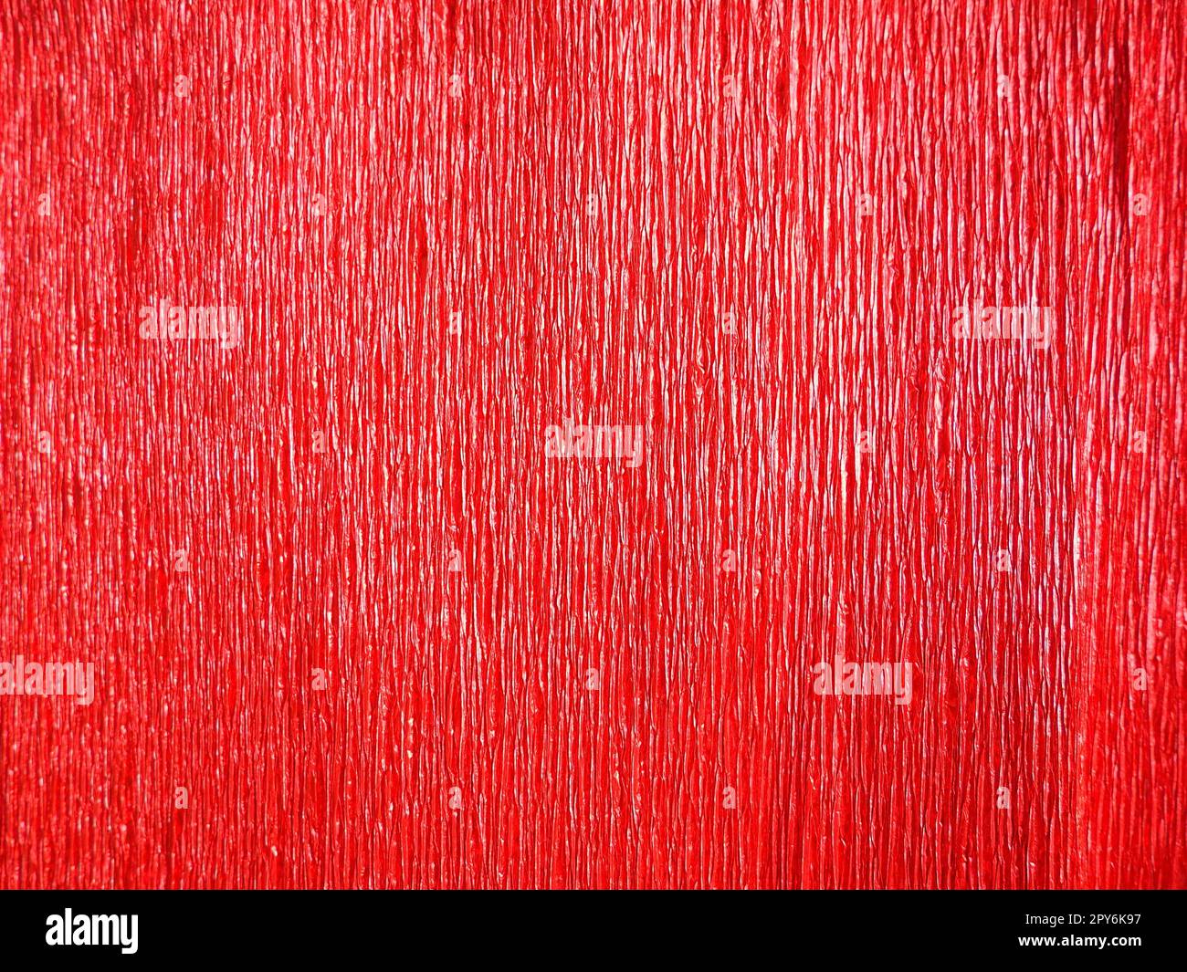 Corrugated paper in red. Uneven surface. Abstract background. Wavy ...