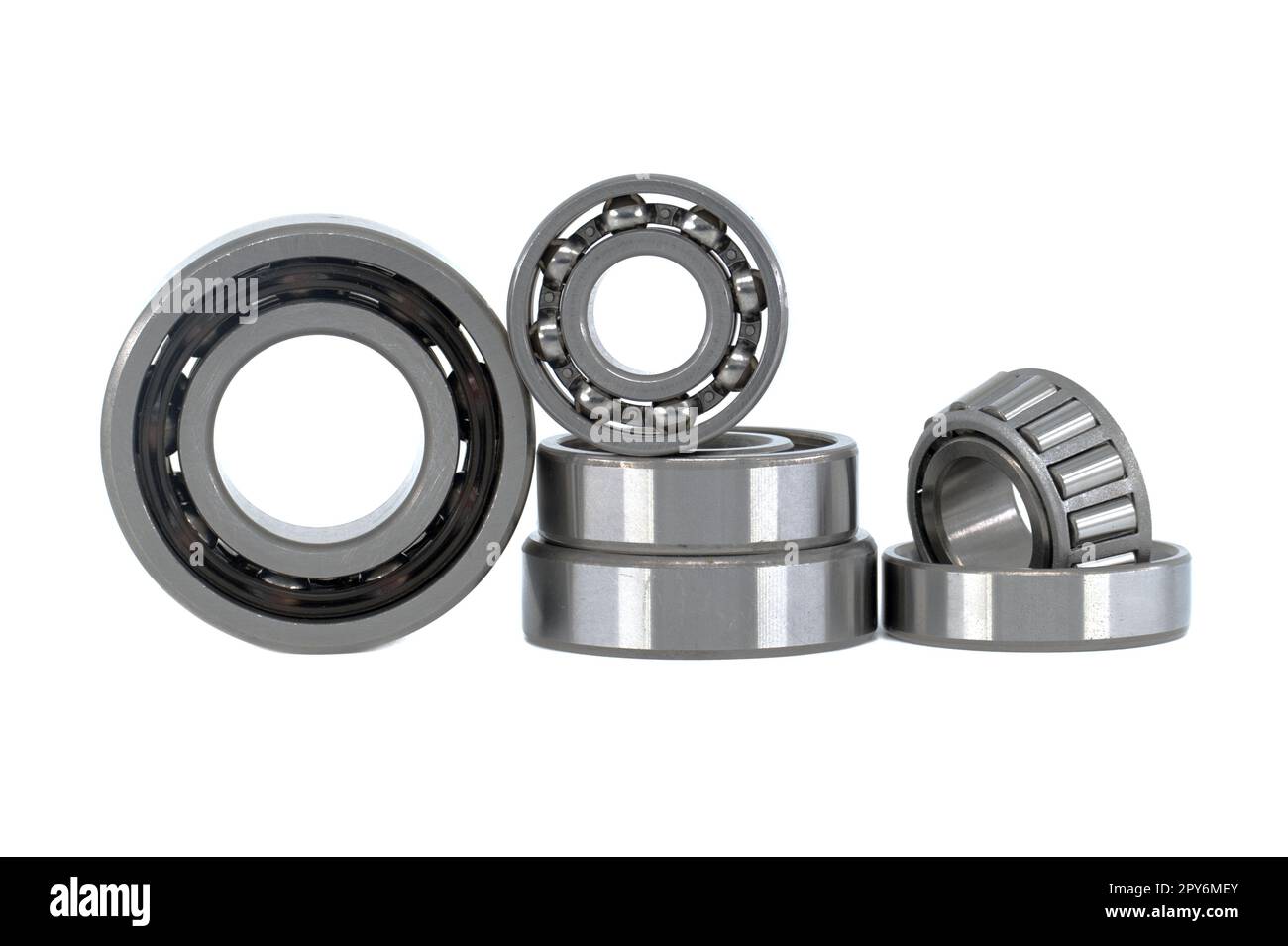 Set of various ball and roller bearings on white Stock Photo - Alamy
