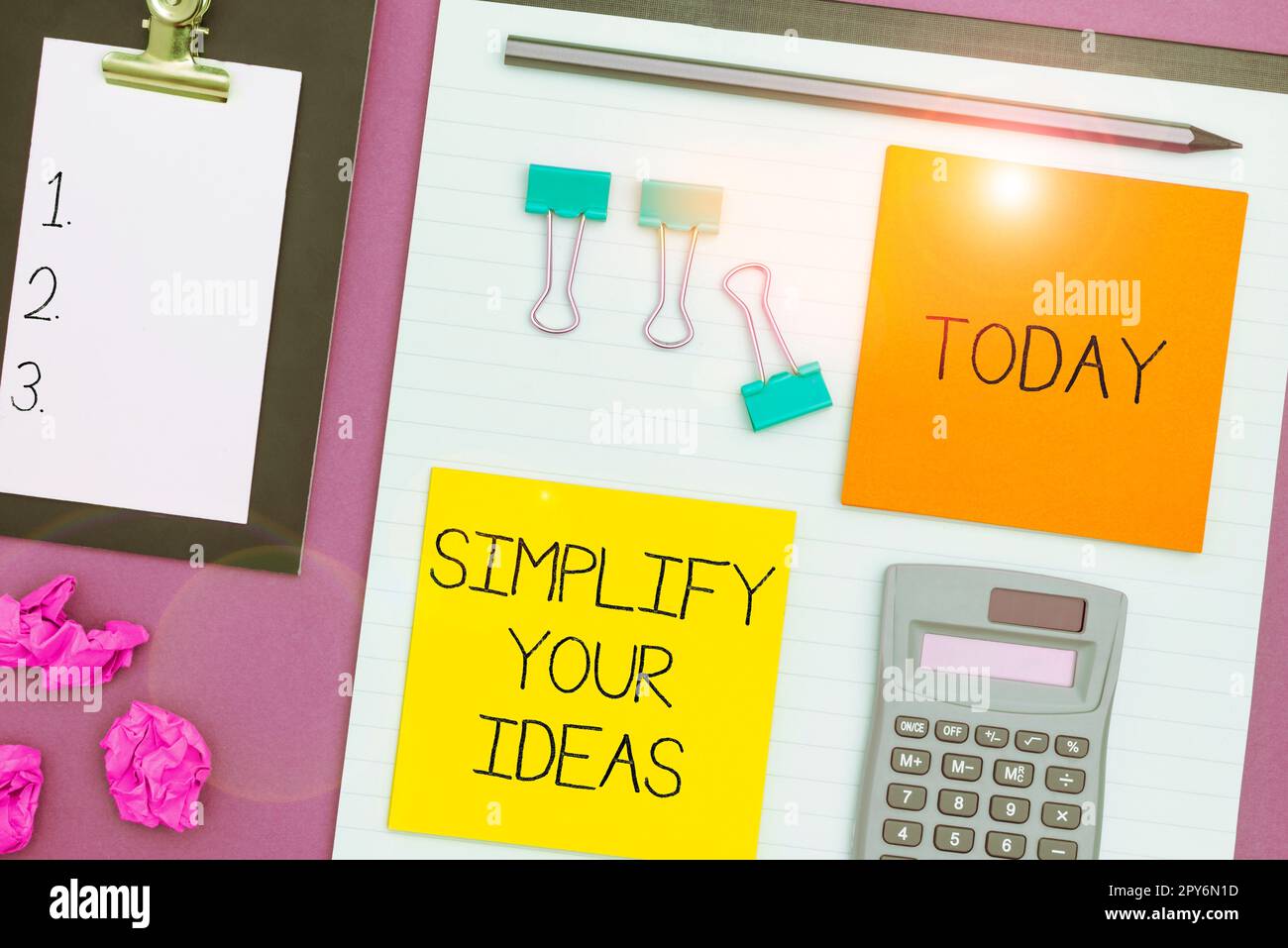 Hand writing sign Simplify Your Ideas. Word Written on make simple or ...