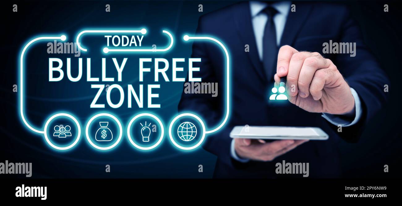 Hand writing sign Bully Free Zone. Concept meaning Be respectful to ...