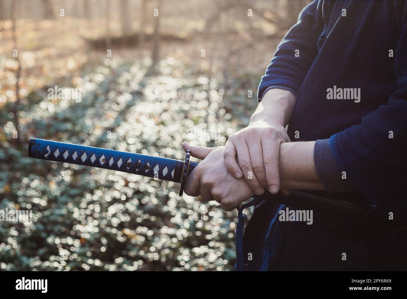 Close up hand with weapon concept photo Stock Photo - Alamy
