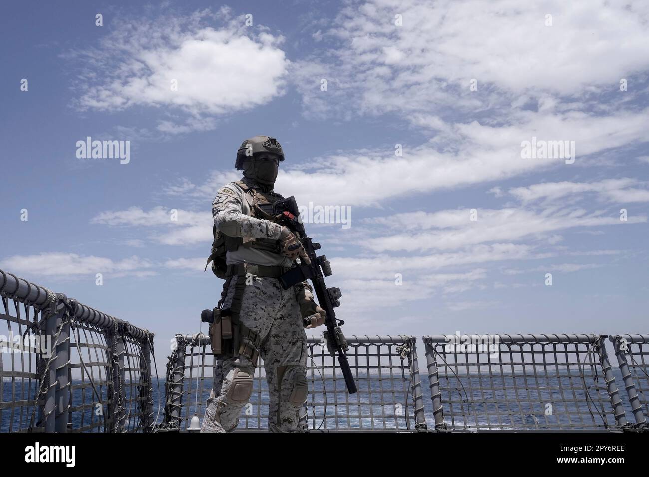 A Saudi commando from Royal Naval Forces stands alert at Al-Jubail ...