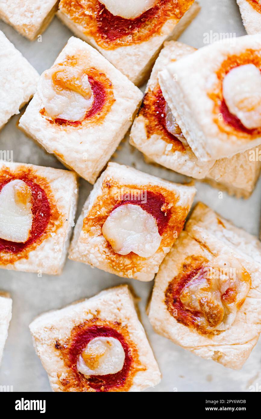 Mini pizzas on a white background, top view Stock Photo - Alamy