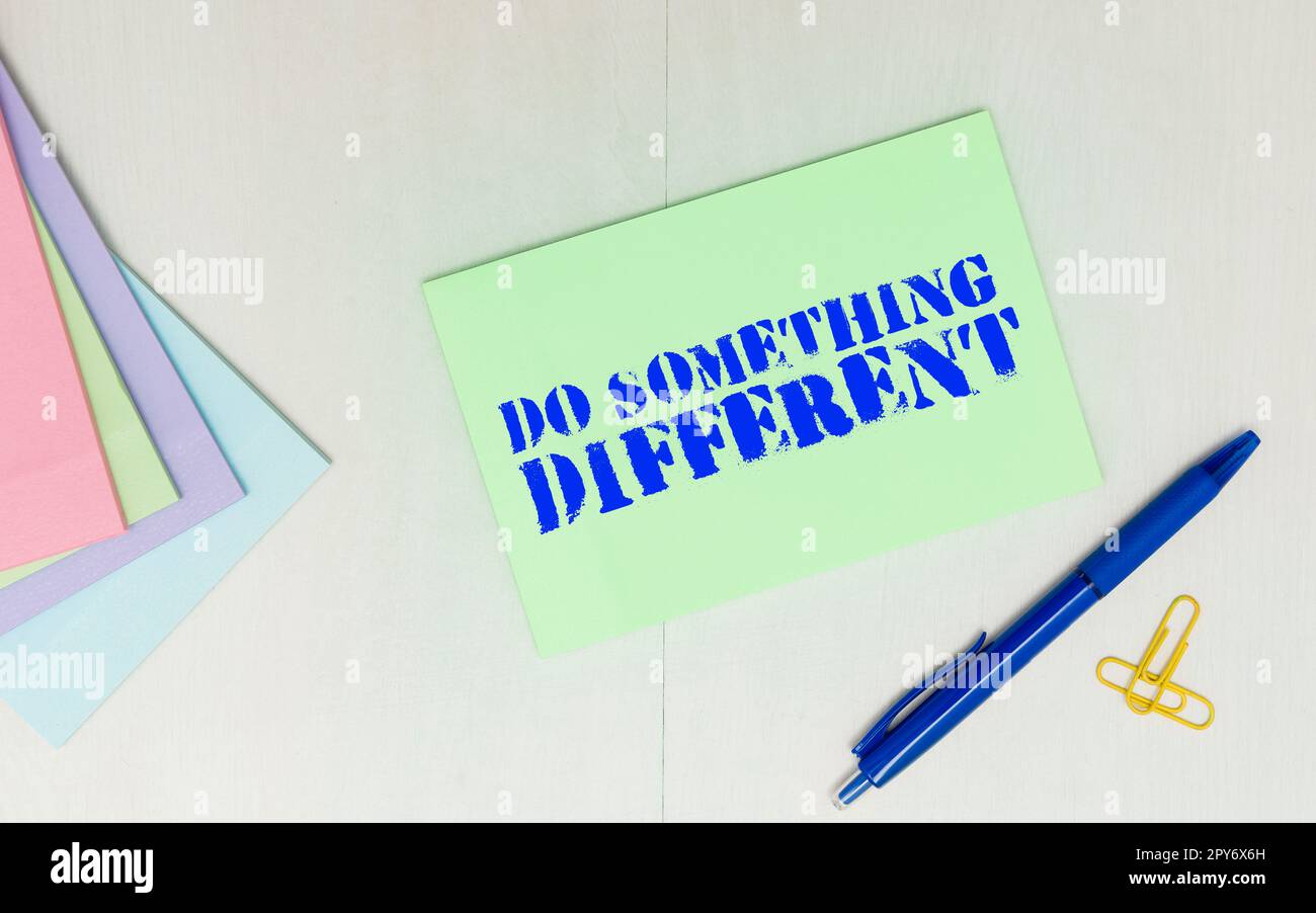 Inspiration showing sign Do Something Different. Word Written on be ...