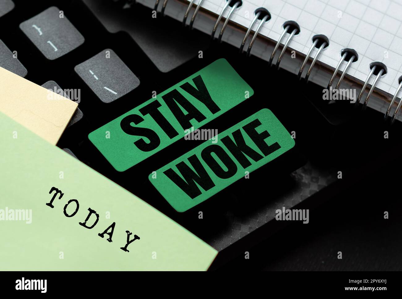 Hand writing sign Stay Woke. Word for being aware of your surroundings ...