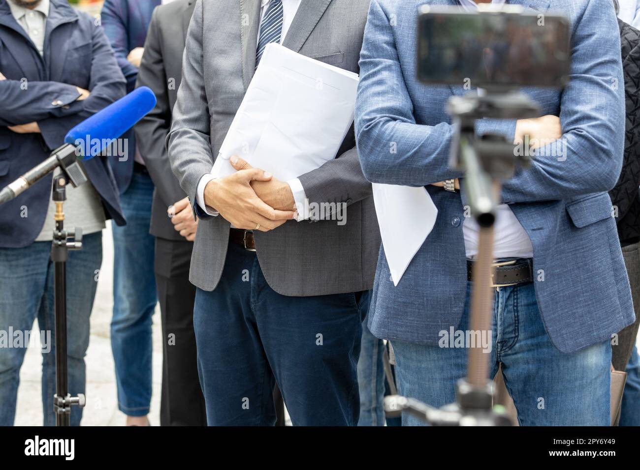 Whistleblower holding documents, giving statement at news conference or ...