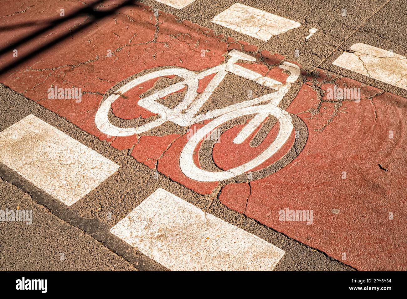 Cycle path, bicycle symbol as a lane marking or road marking on a road ...