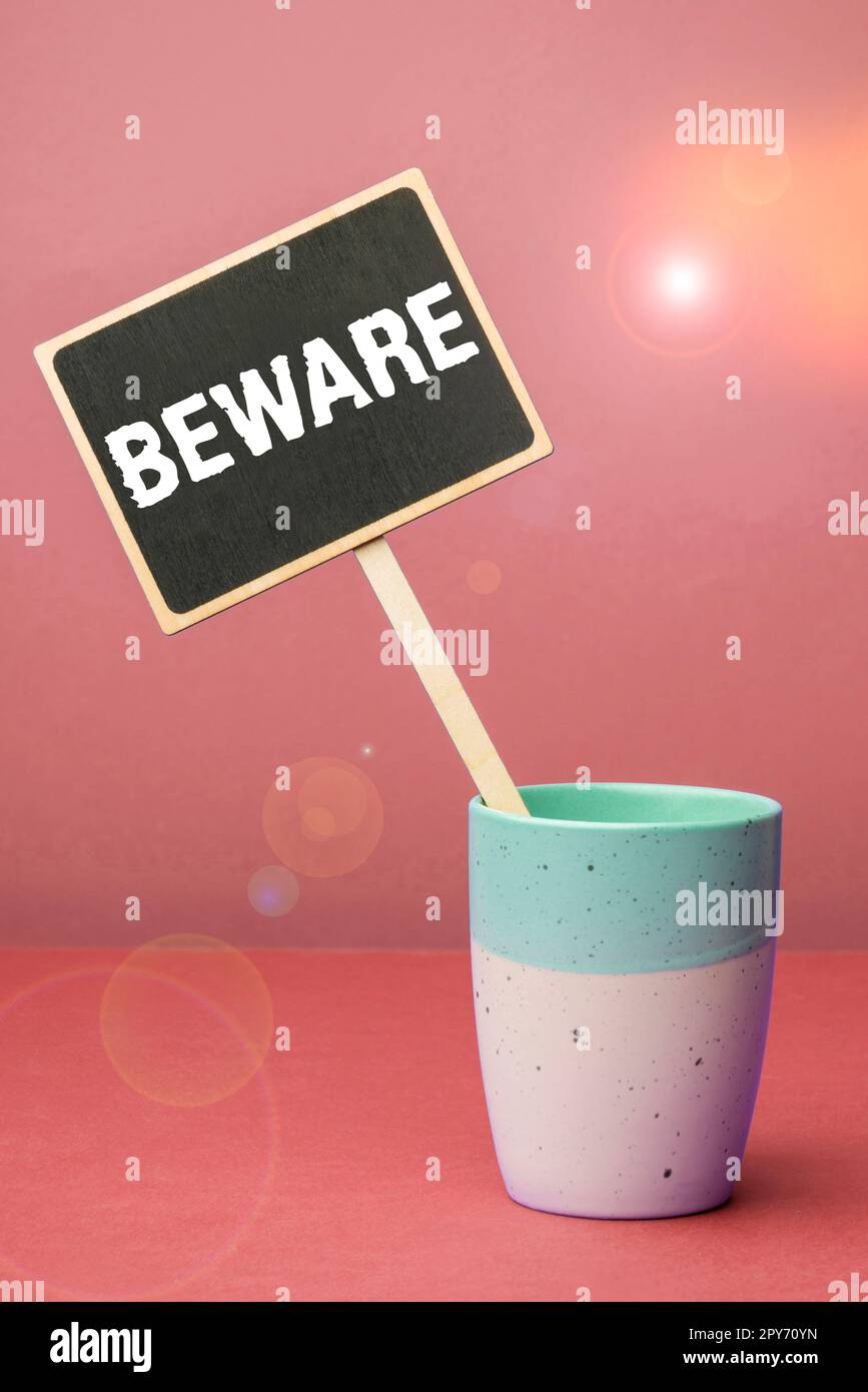 Writing displaying text Beware. Internet Concept used to warn someone ...