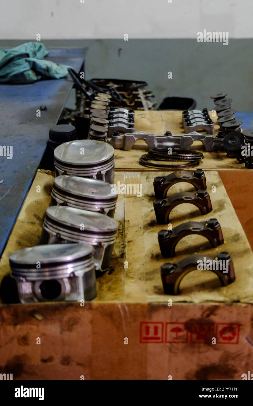 spare parts such as pistons, valves and other gasoline engine parts ...