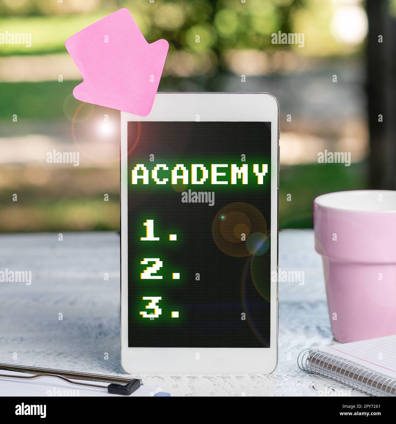 Sign displaying Academy. Word for where students can go to receive ...