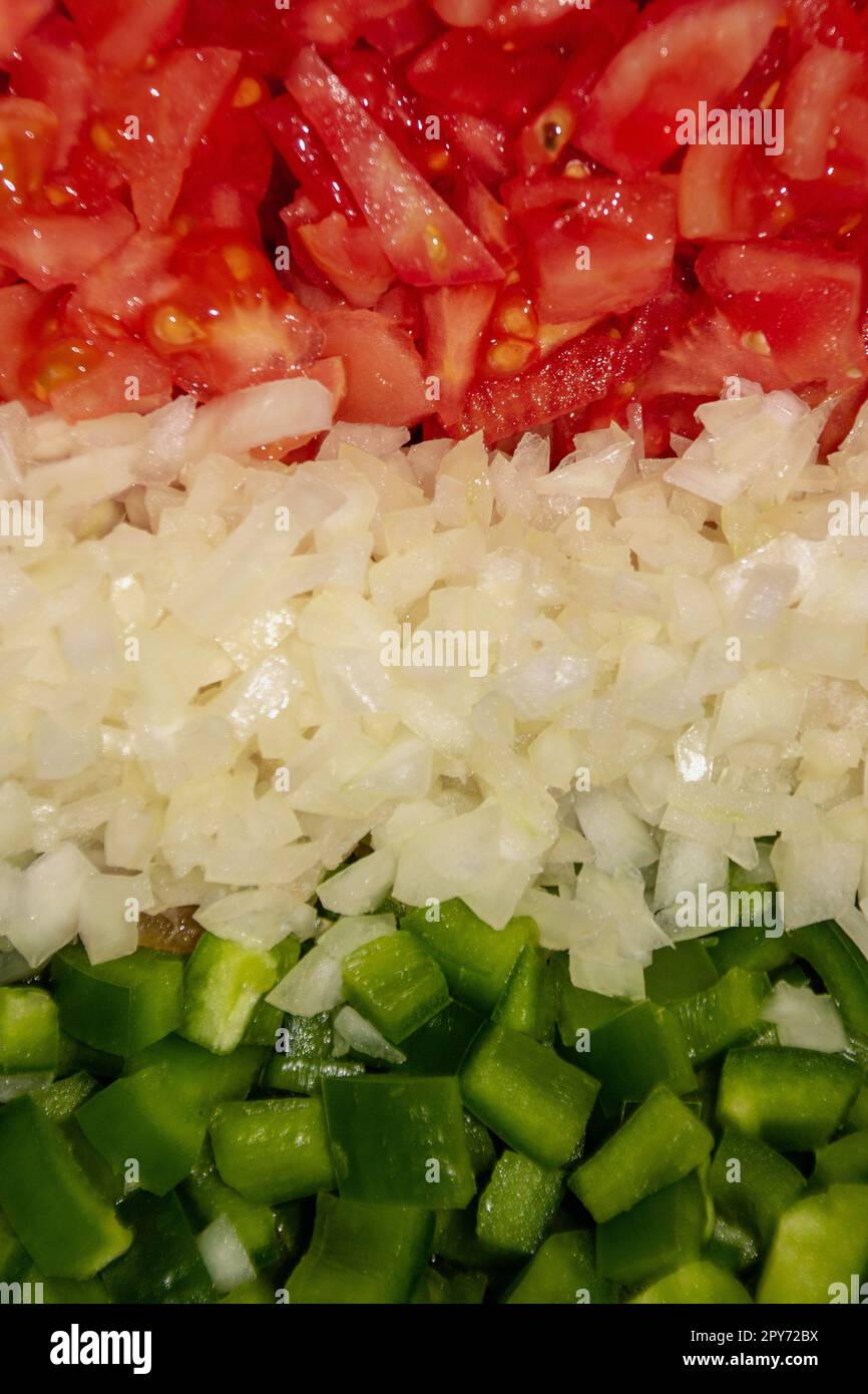 Tomato, green pepper and onion cut into dice in a bowl Stock Photo - Alamy