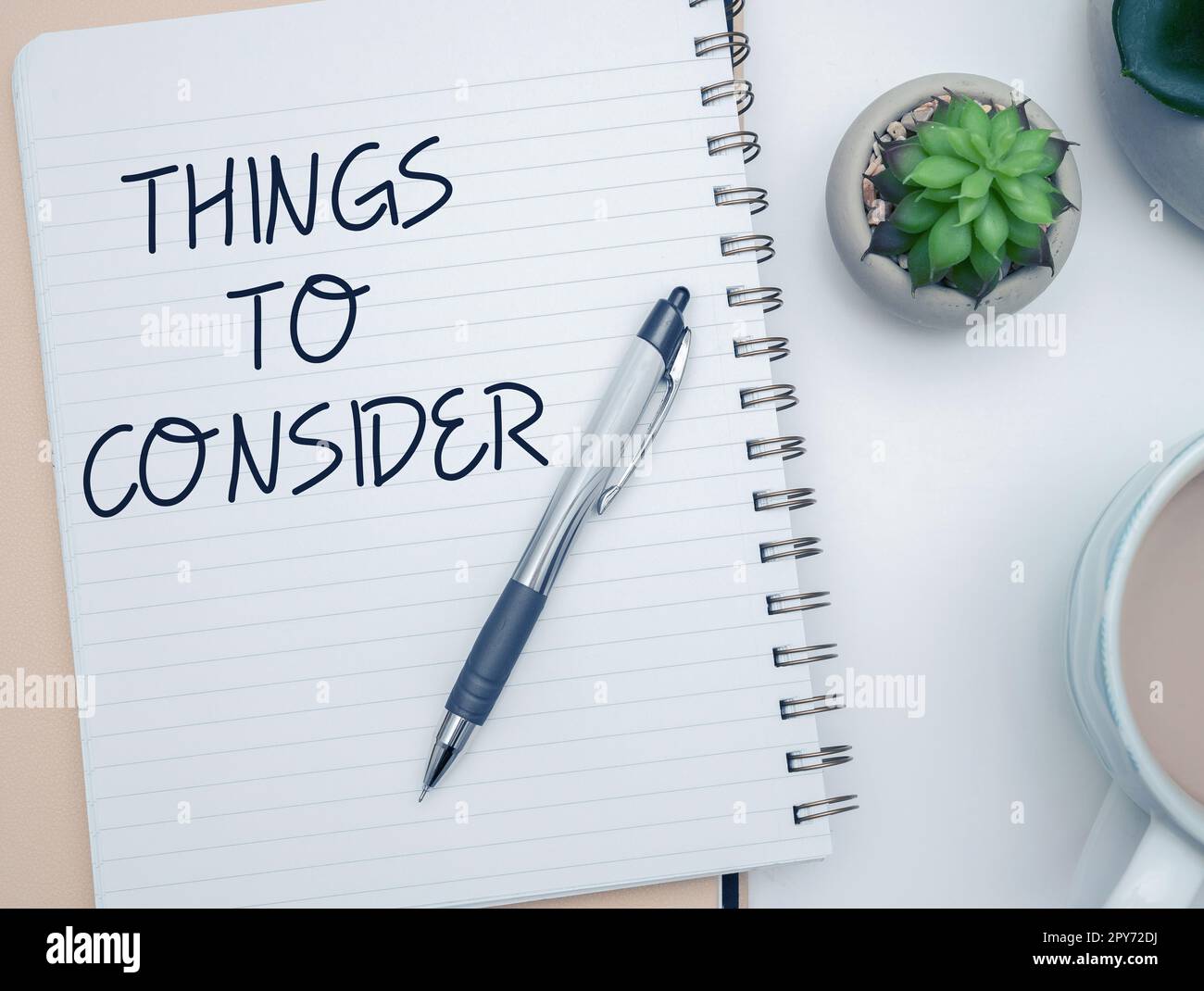 Hand writing sign Things To Consider. Business concept list to check or ...