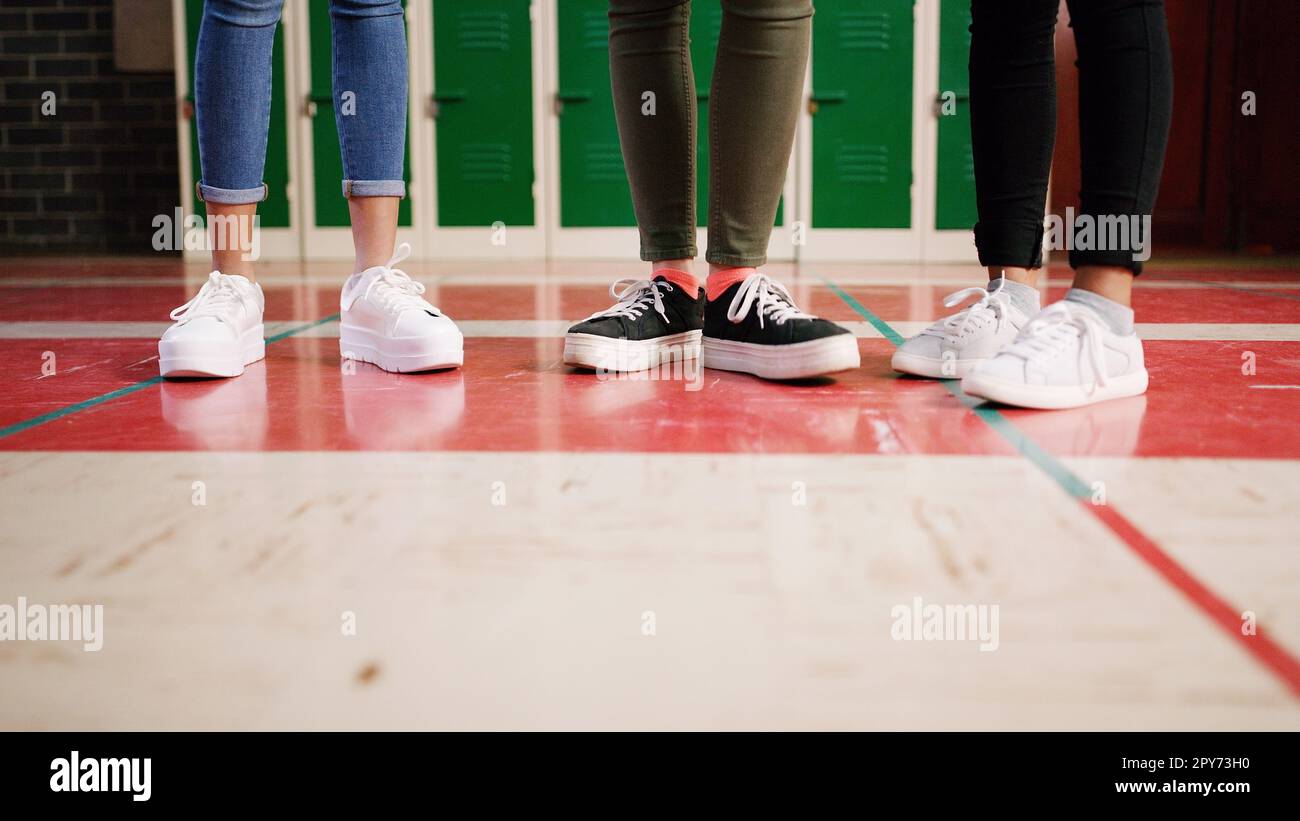 Spot the difference. Low angle shot of a group of unrecognizable ...