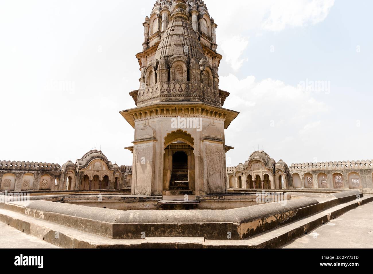 The historic tower of the Orchha Fort in India, with its intricate ...