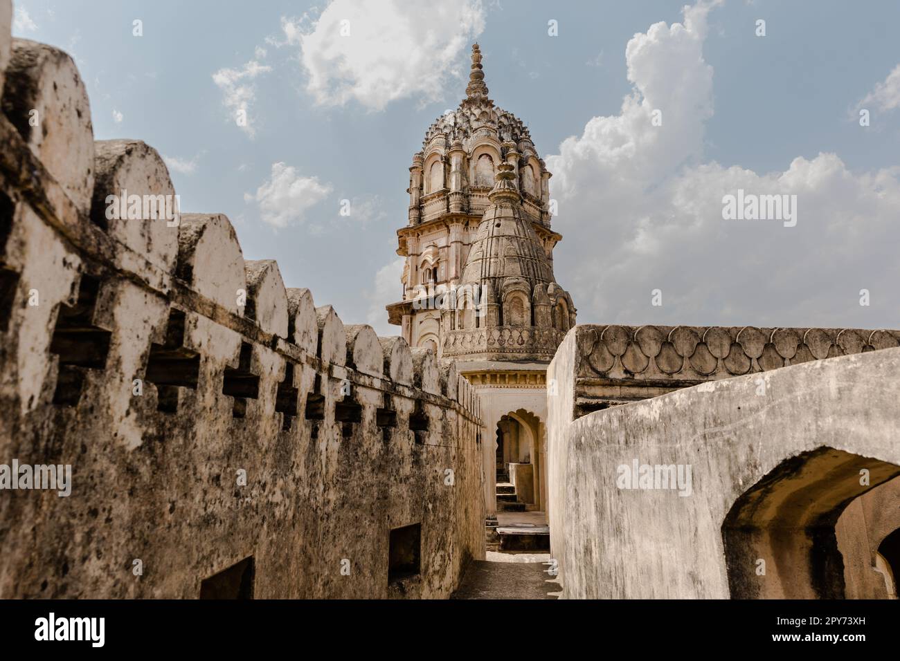The historic tower of the Orchha Fort in India, with its intricate ...
