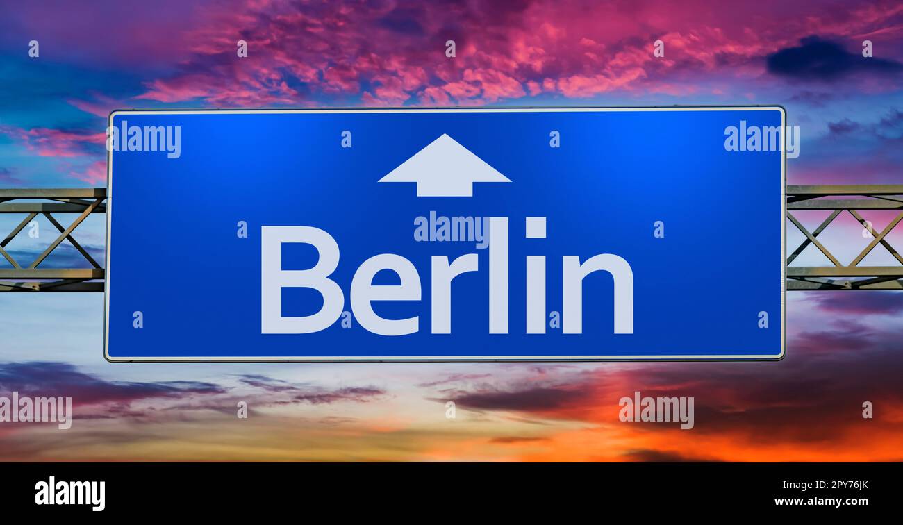 Road sign indicating direction to the city of Berlin Stock Photo - Alamy