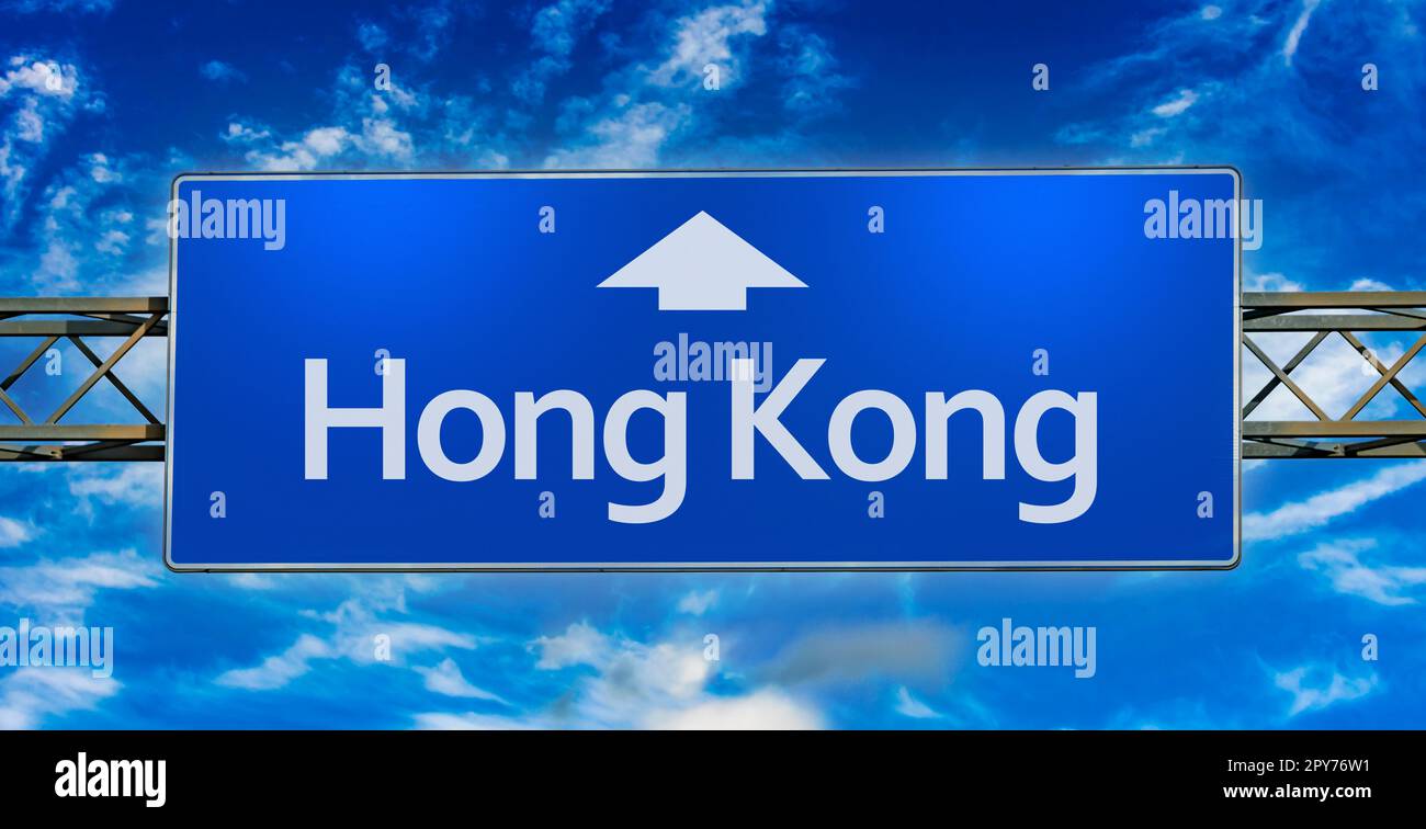 Road sign indicating direction to the city of Hong Kong Stock Photo - Alamy