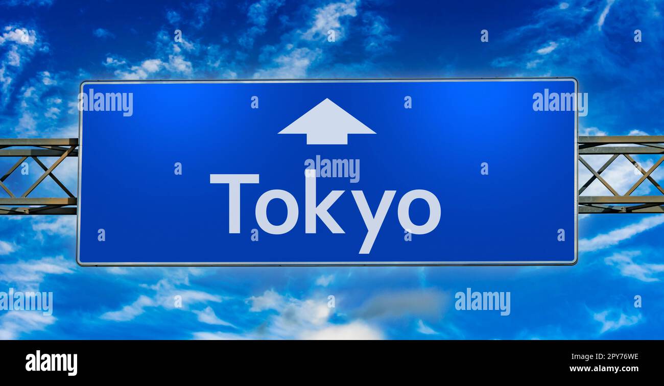 Road sign indicating direction to the city of Tokyo Stock Photo - Alamy