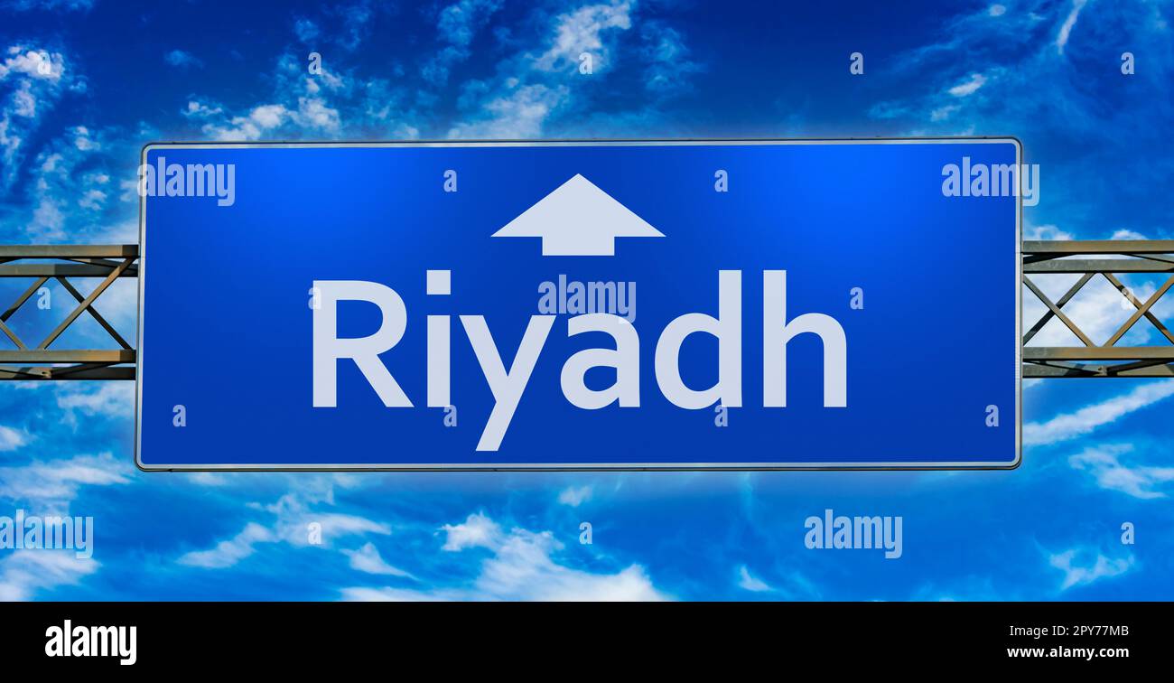 Road sign indicating direction to the city of Riyadh Stock Photo - Alamy