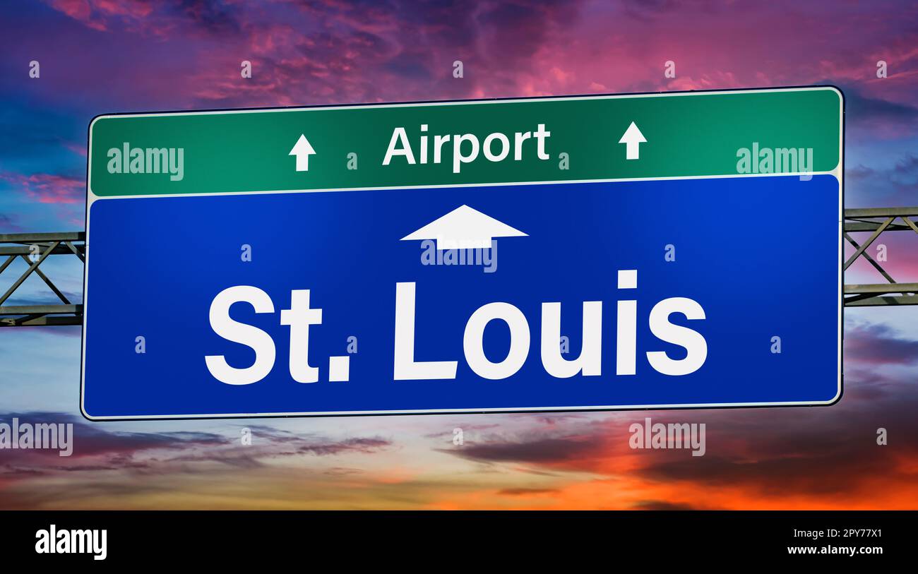 Road sign indicating direction to the city of St. Louis Stock Photo - Alamy