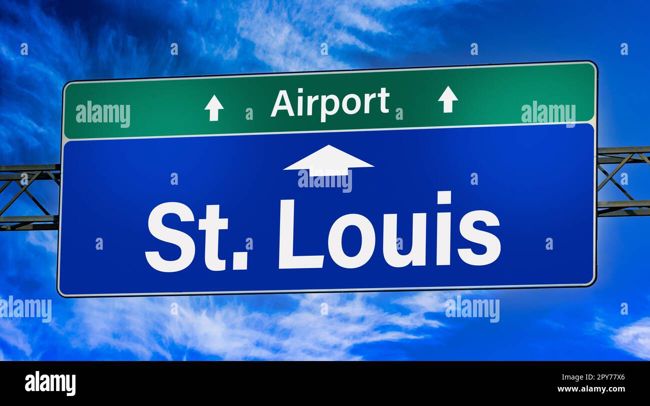 Road sign indicating direction to the city of St. Louis Stock Photo - Alamy