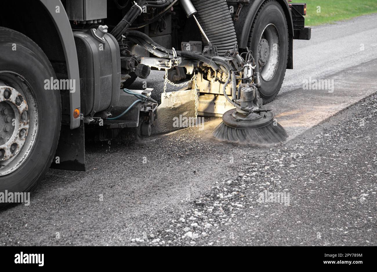 Close up view of heavy duty street cleaning vacuum machine known as ...