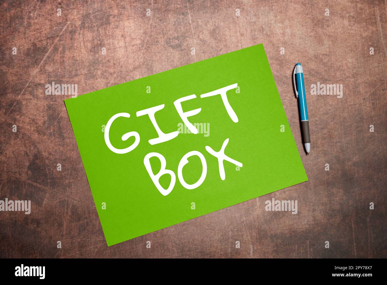 Hand writing sign Gift Box. Word Written on A small cointainer with ...