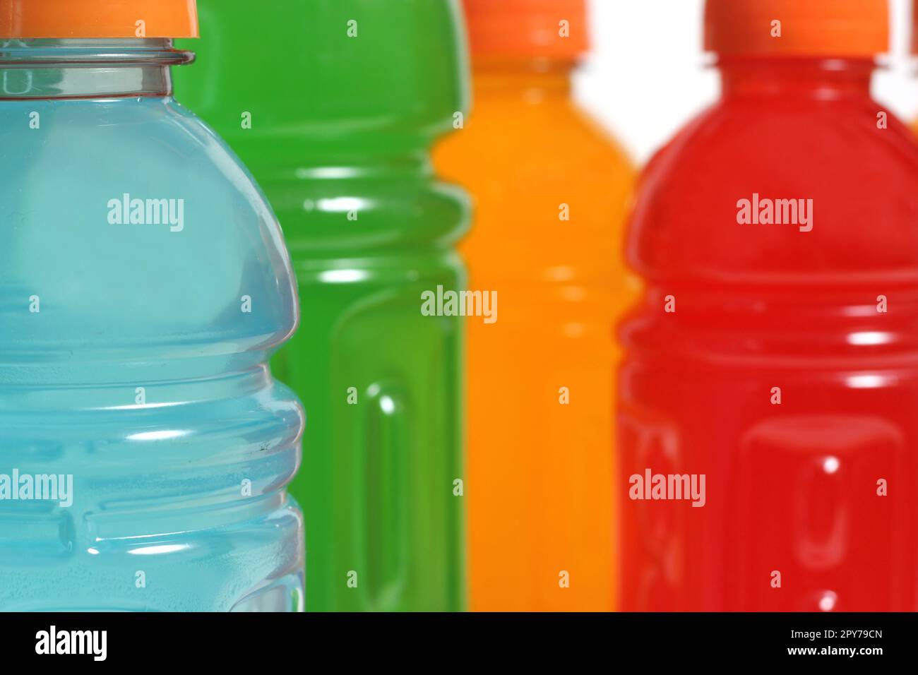 Bottles of Colorful Sports Drinks on White Background Stock Photo - Alamy
