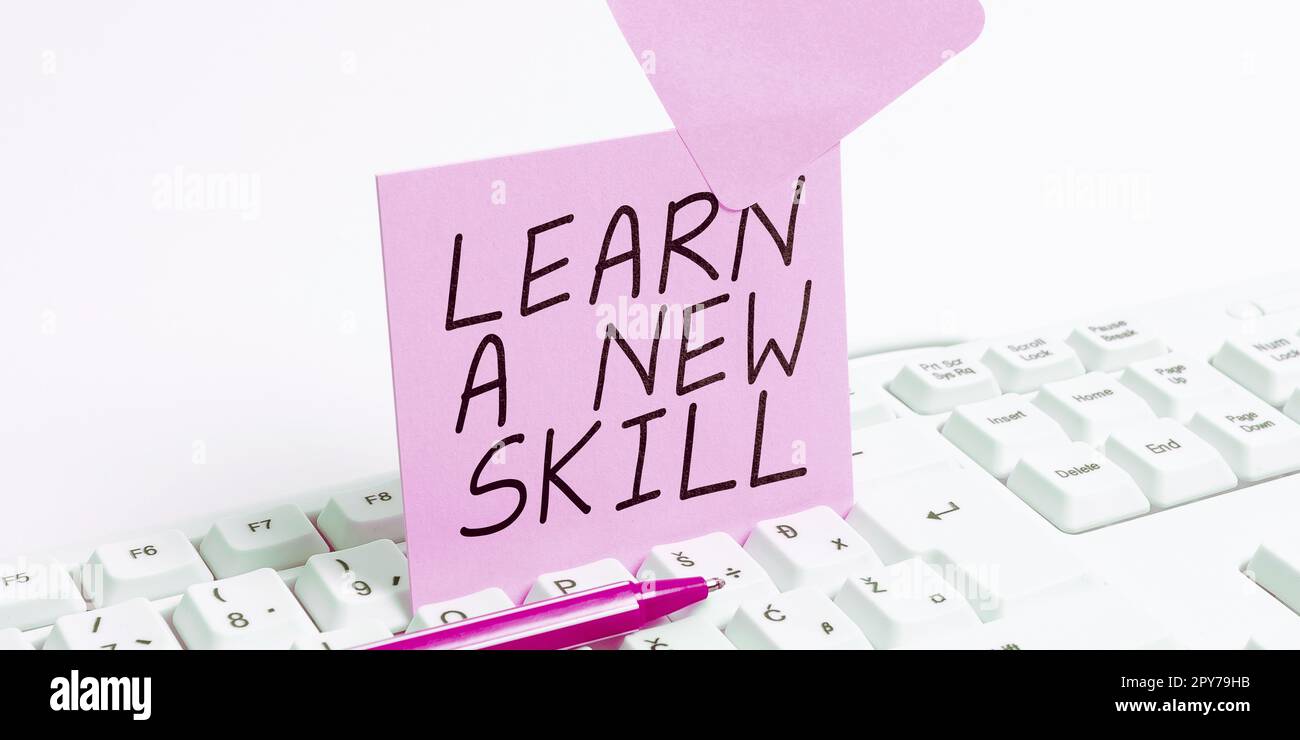 Hand writing sign Learn A New Skill. Business showcase acquisition knowledge through study ...