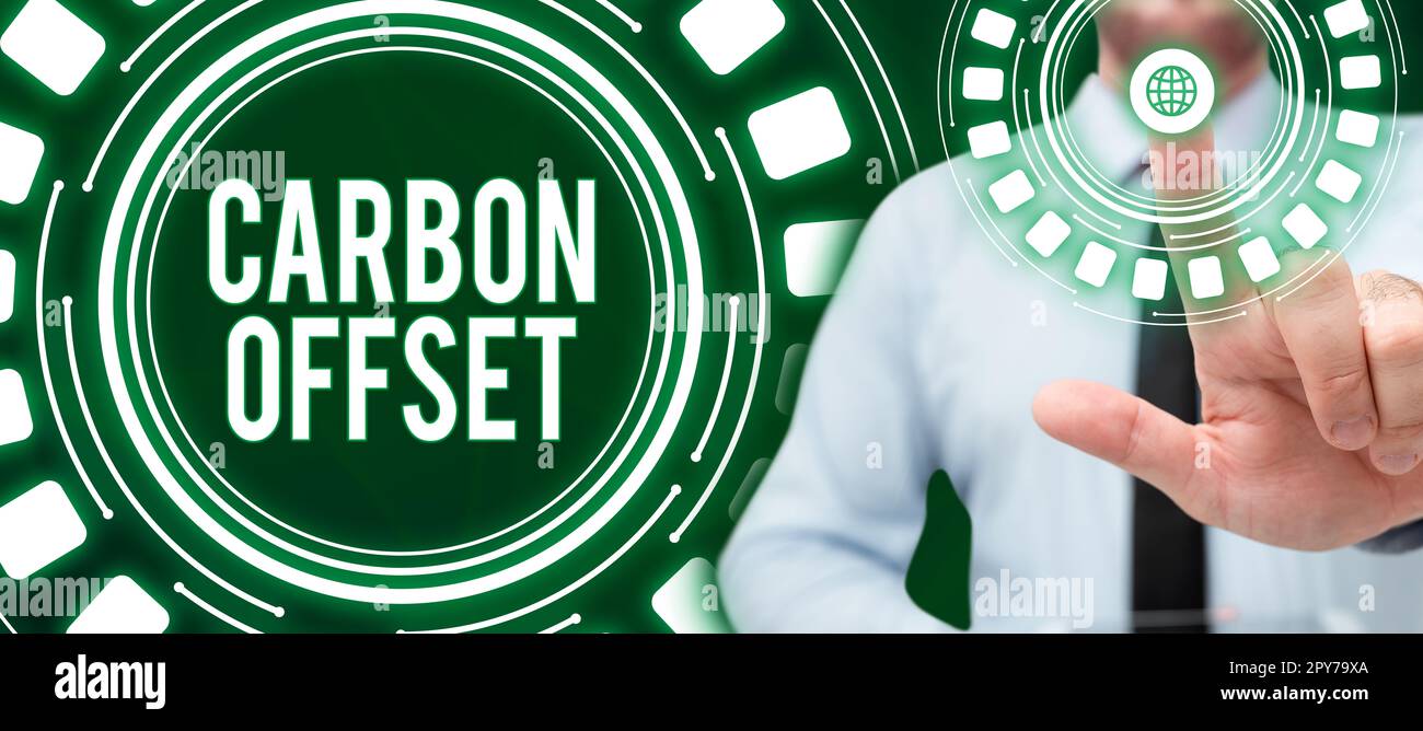 Hand writing sign Carbon Offset. Conceptual photo Reduction in ...