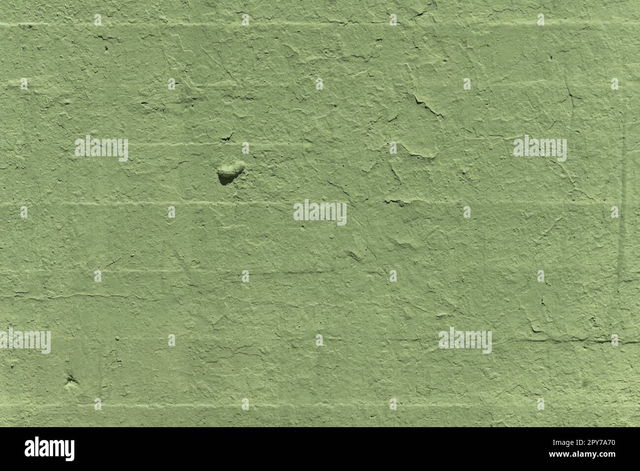 A green painted brick wall with chips and lumps. vector paint texture ...