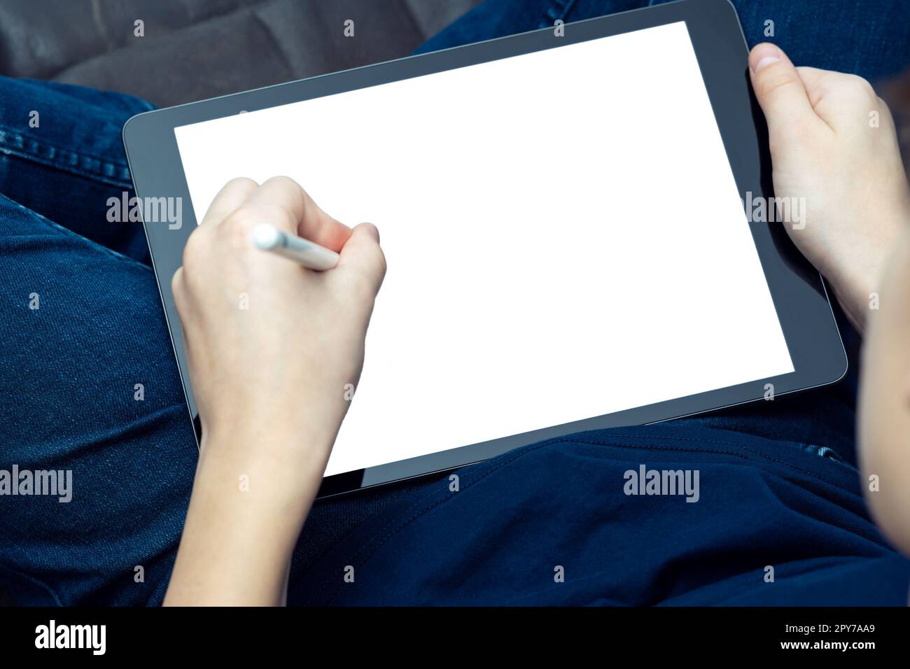 Unrecognizable male hands draw with stylus on digital tab, pad ...