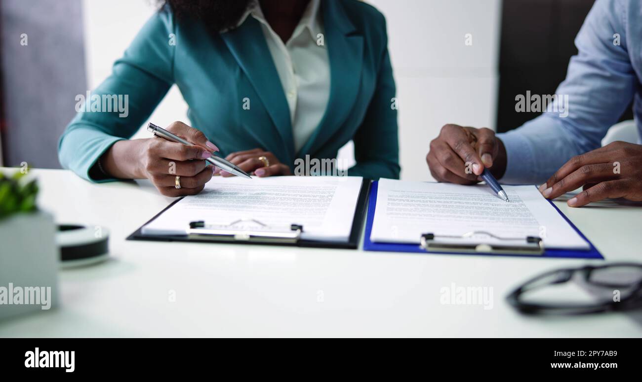 Two Businesspeople Hand Working Stock Photo - Alamy
