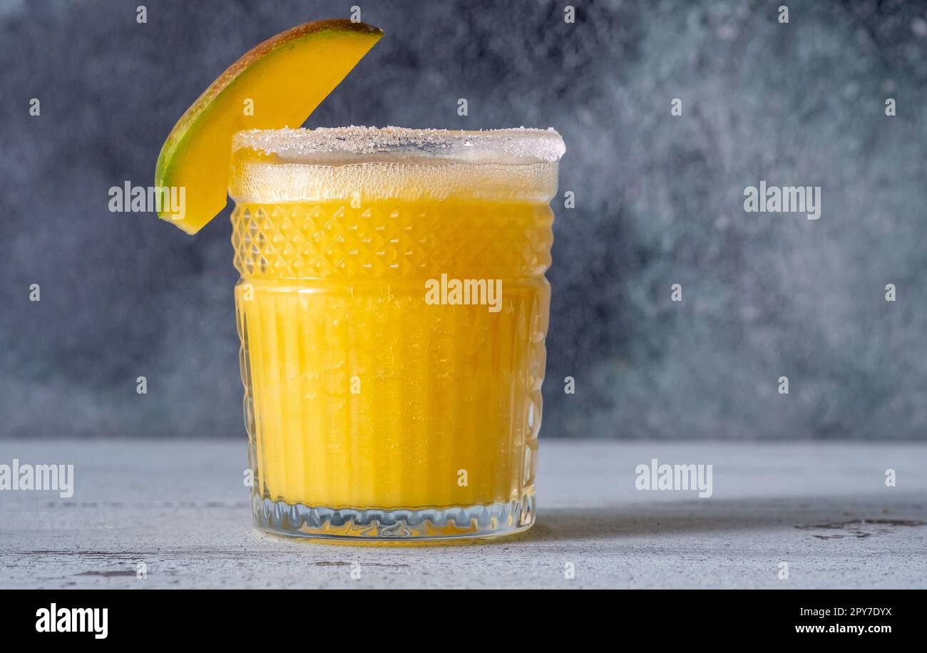 Frozen Mango Margarita cocktail Stock Photo - Alamy