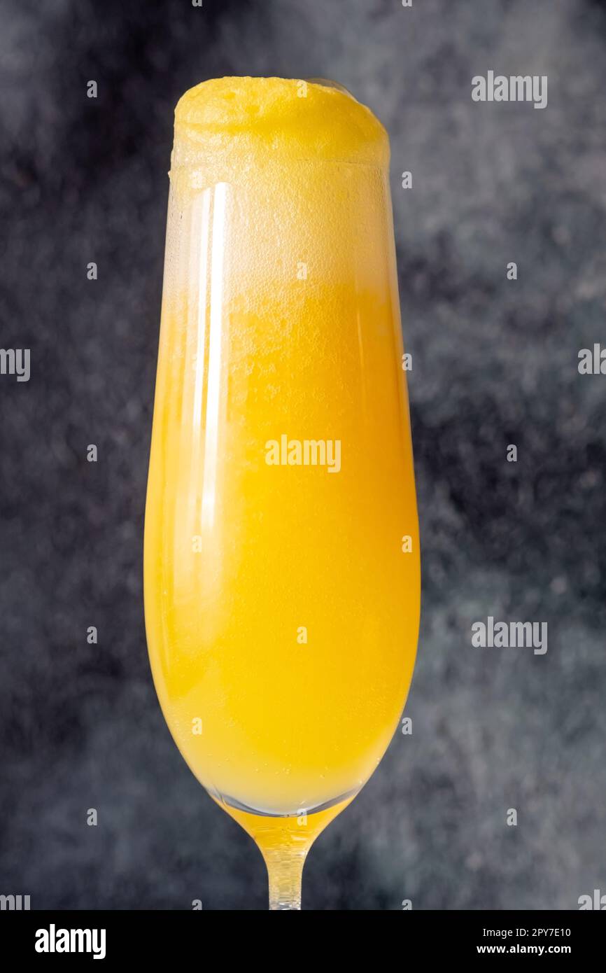 Mango Mimosa cocktail Stock Photo - Alamy
