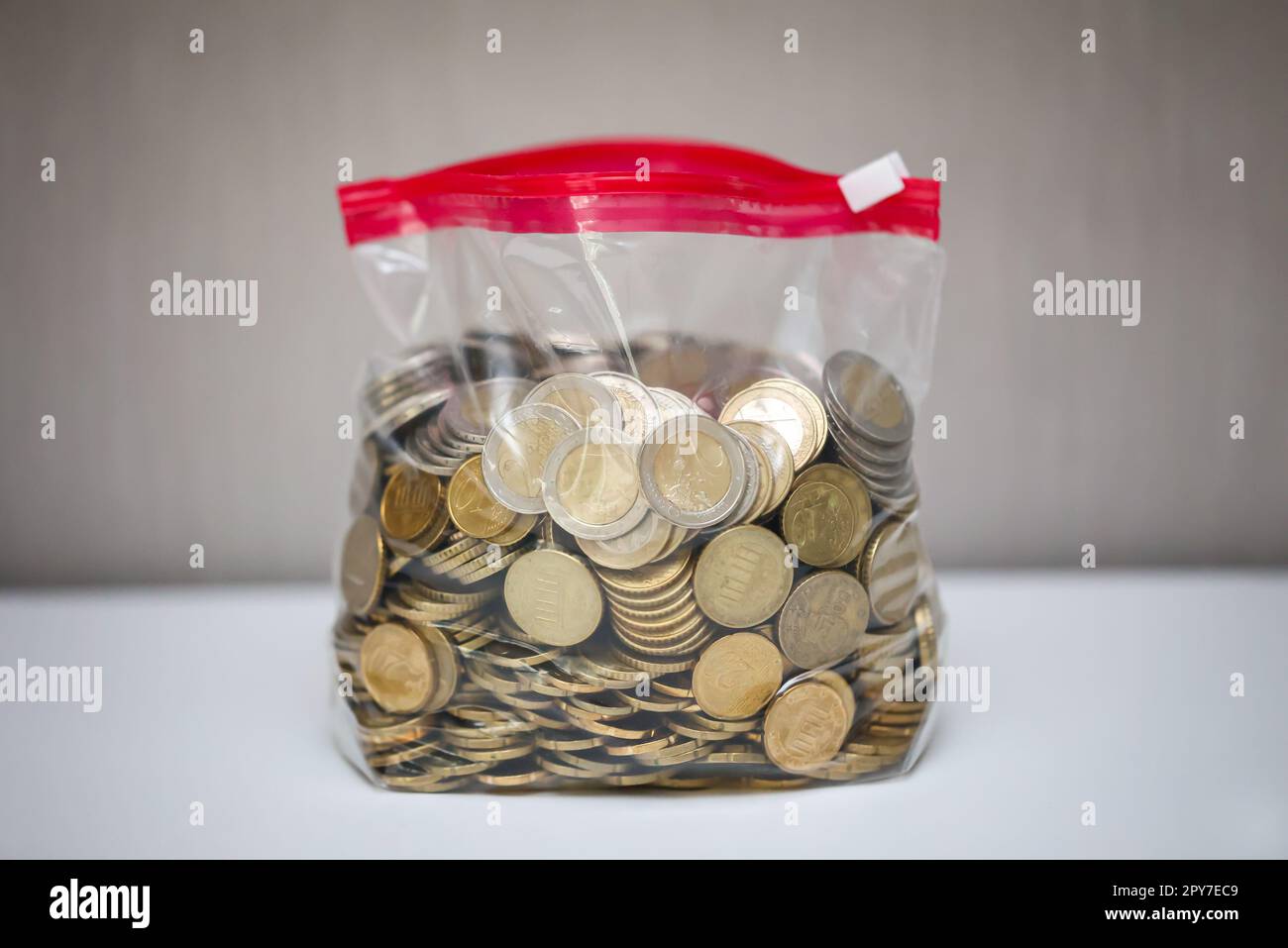 A bag of euro coins hi-res stock photography and images - Alamy