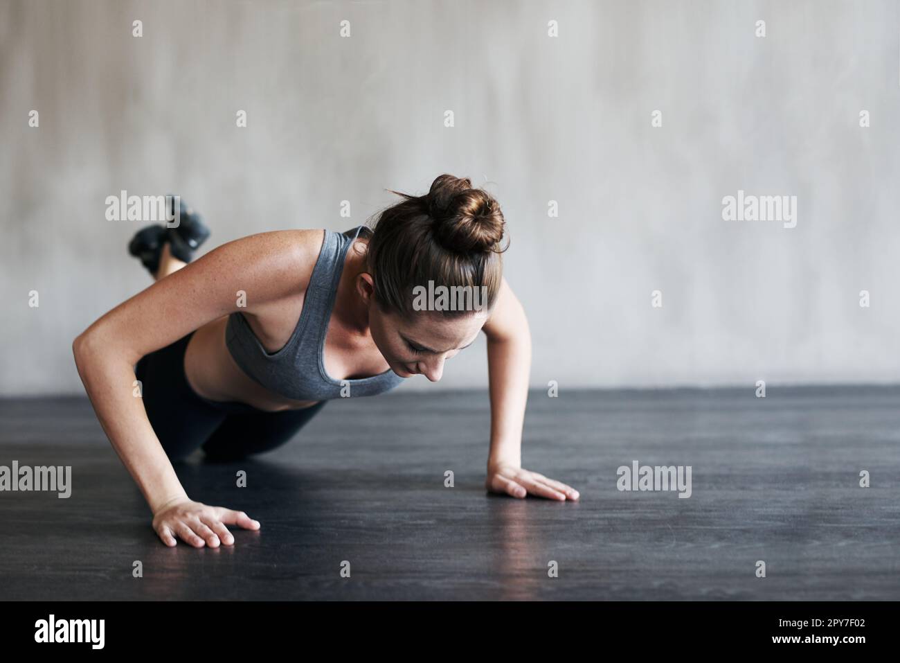 Fitness workout, active and woman doing push up for exercise, health ...