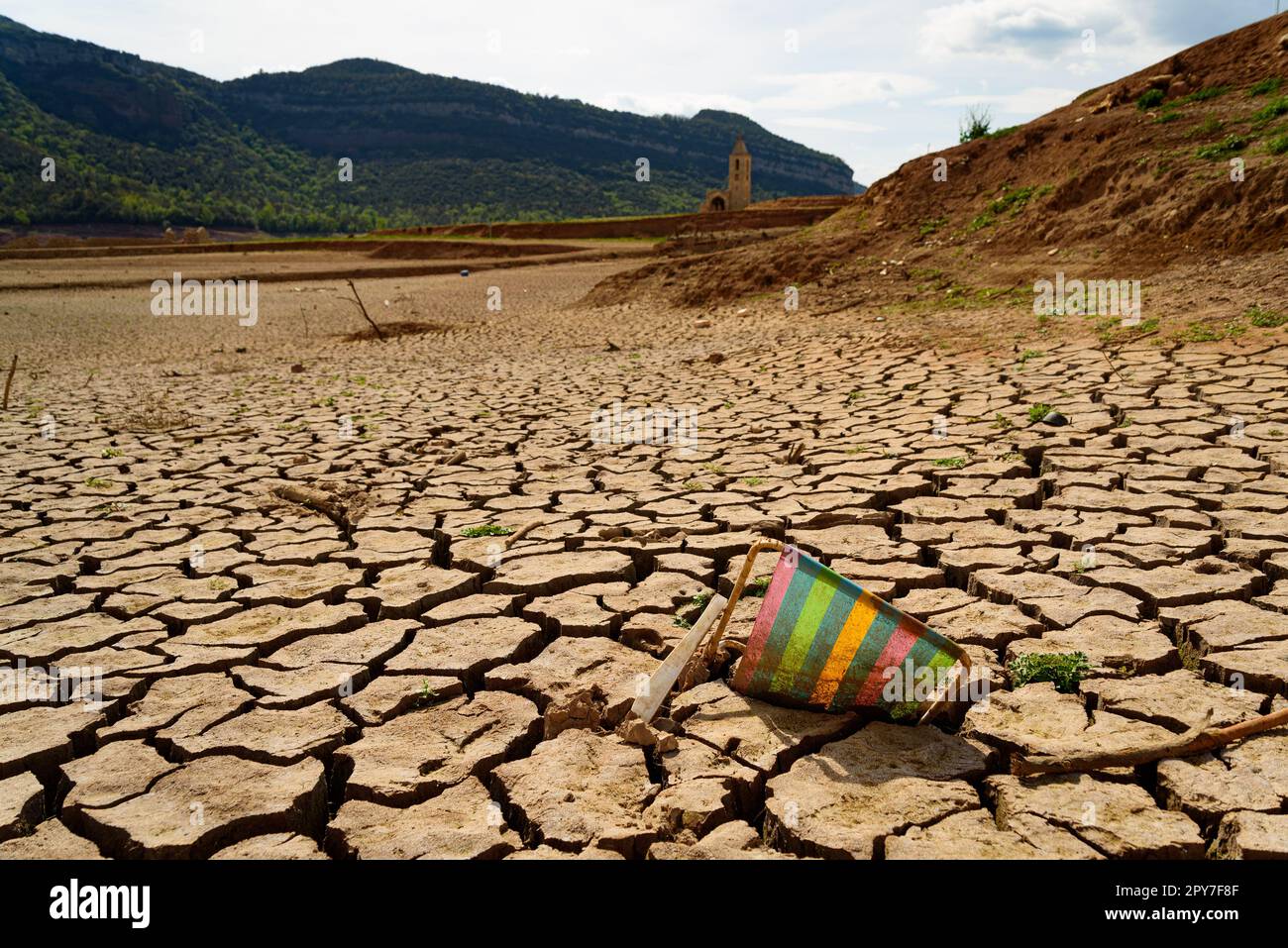 Scorched earth and earth clods are seen on dry land caused by drought ...
