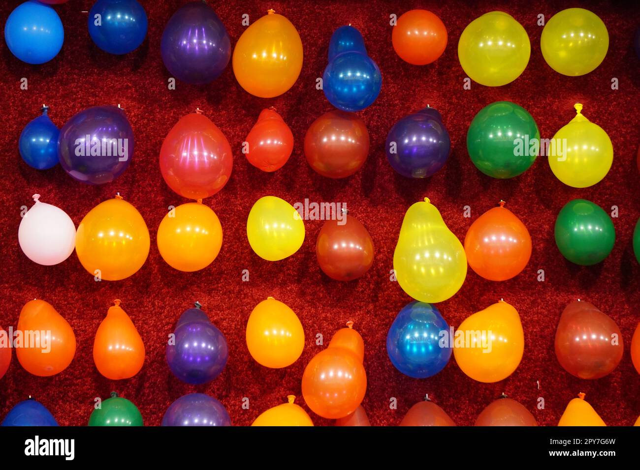 A cheerful scene of colorful balloons at an outdoor carnival Stock ...