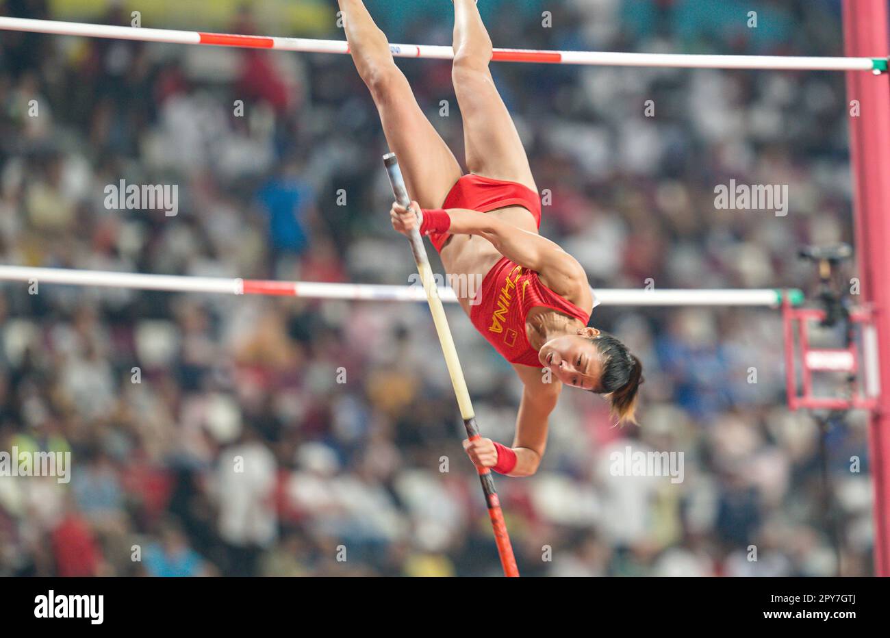 Li Ling participating in the pole vault at the Doha 2019 World ...