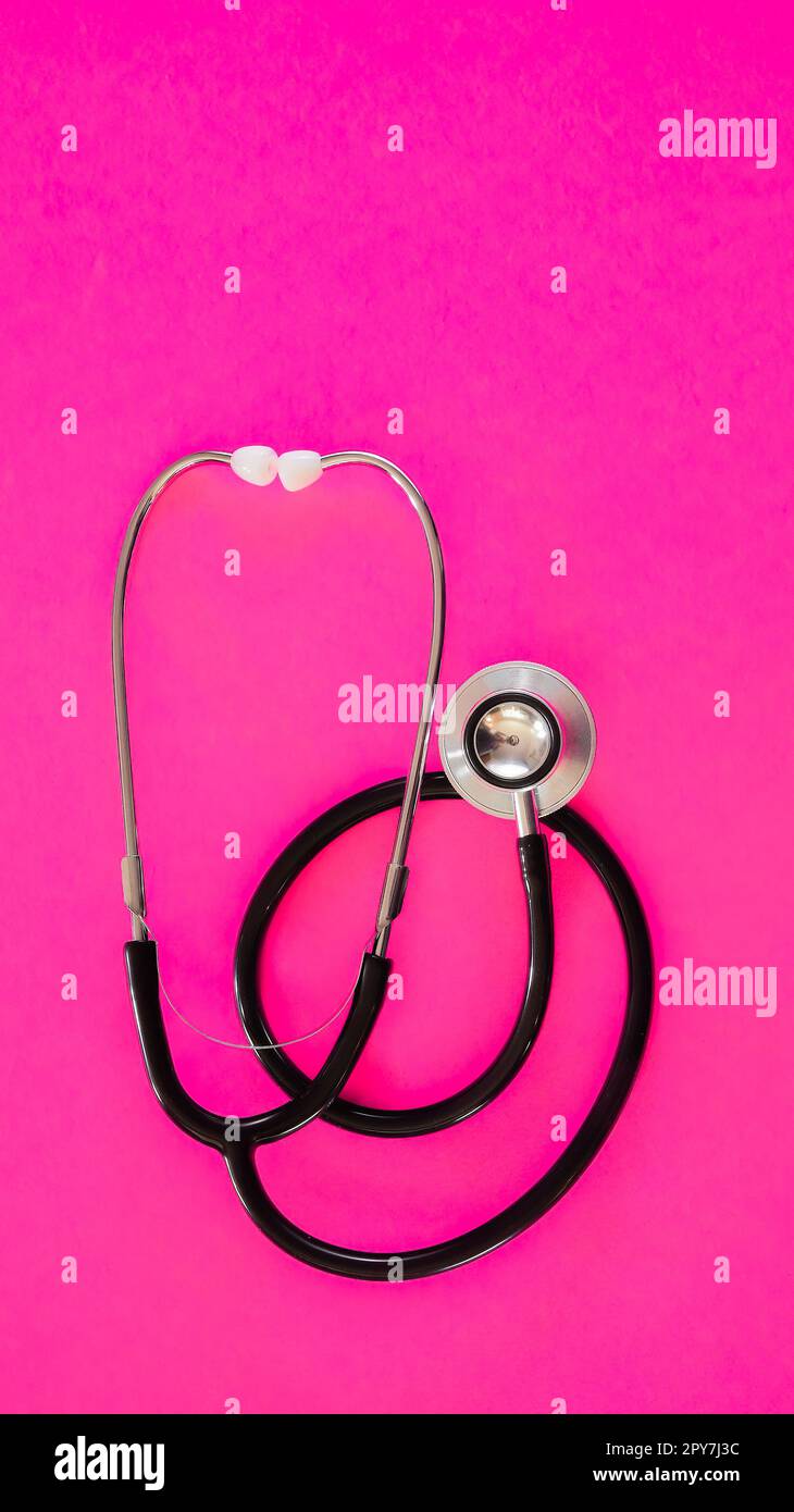Stethoscope isolated on pink background Stock Photo - Alamy