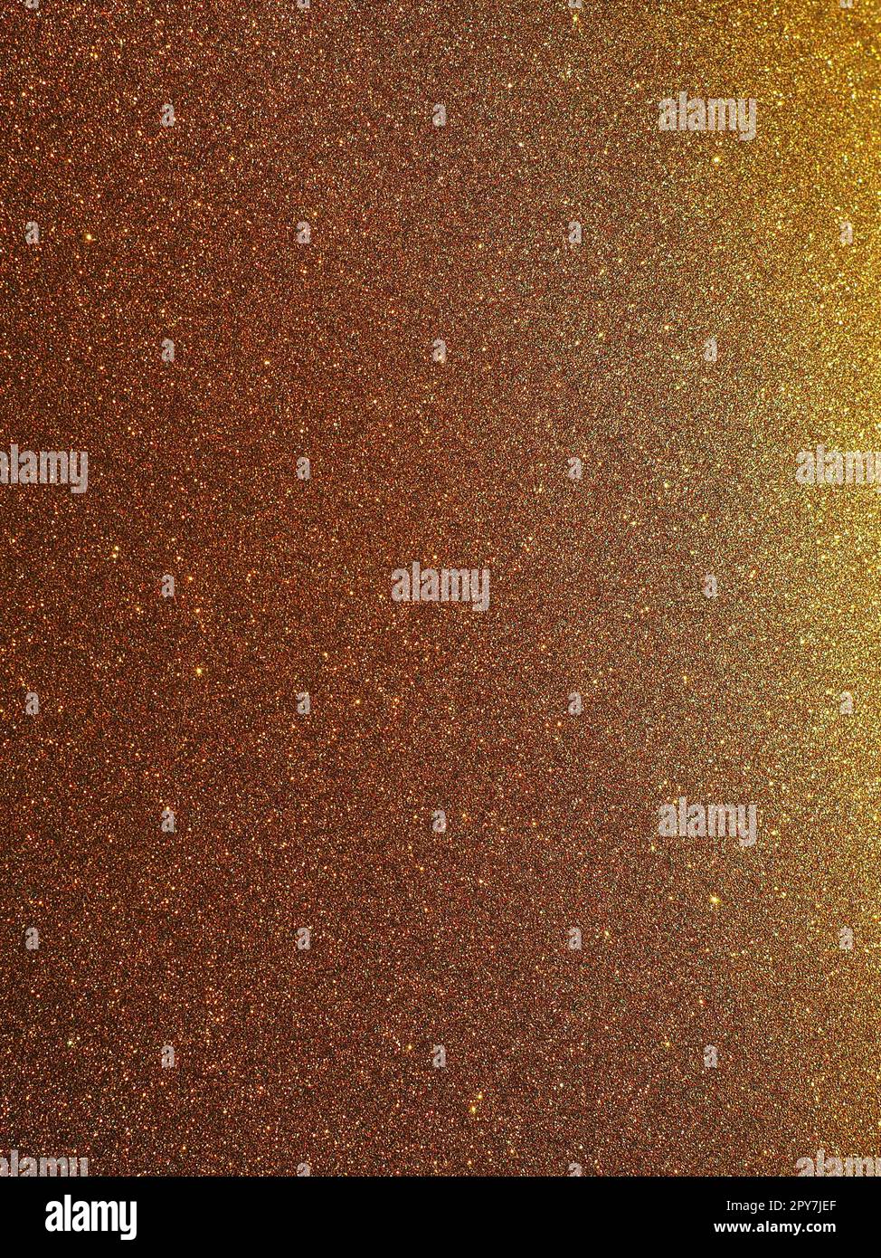 Bokeh light of gold glitters. Golden glitter texture background ...