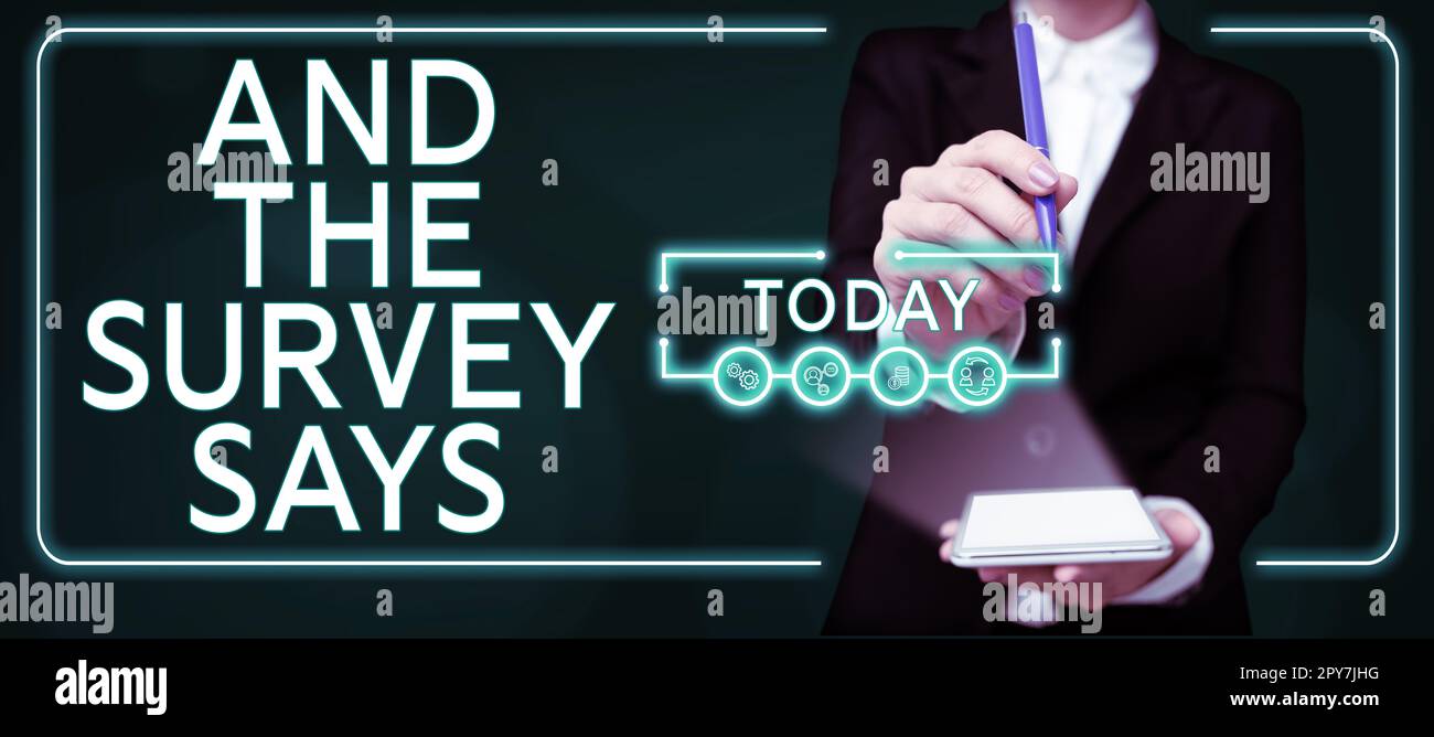 Hand writing sign And The Survey Says. Word Written on doing poll and ...