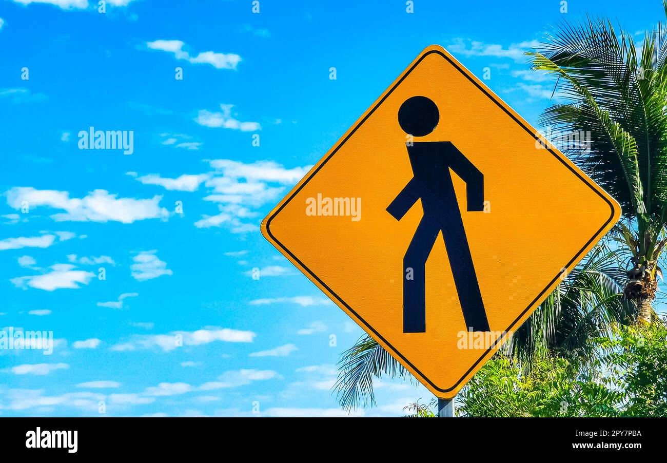 Yellow pedestrian sign street sign in Puerto Escondido Mexico Stock ...