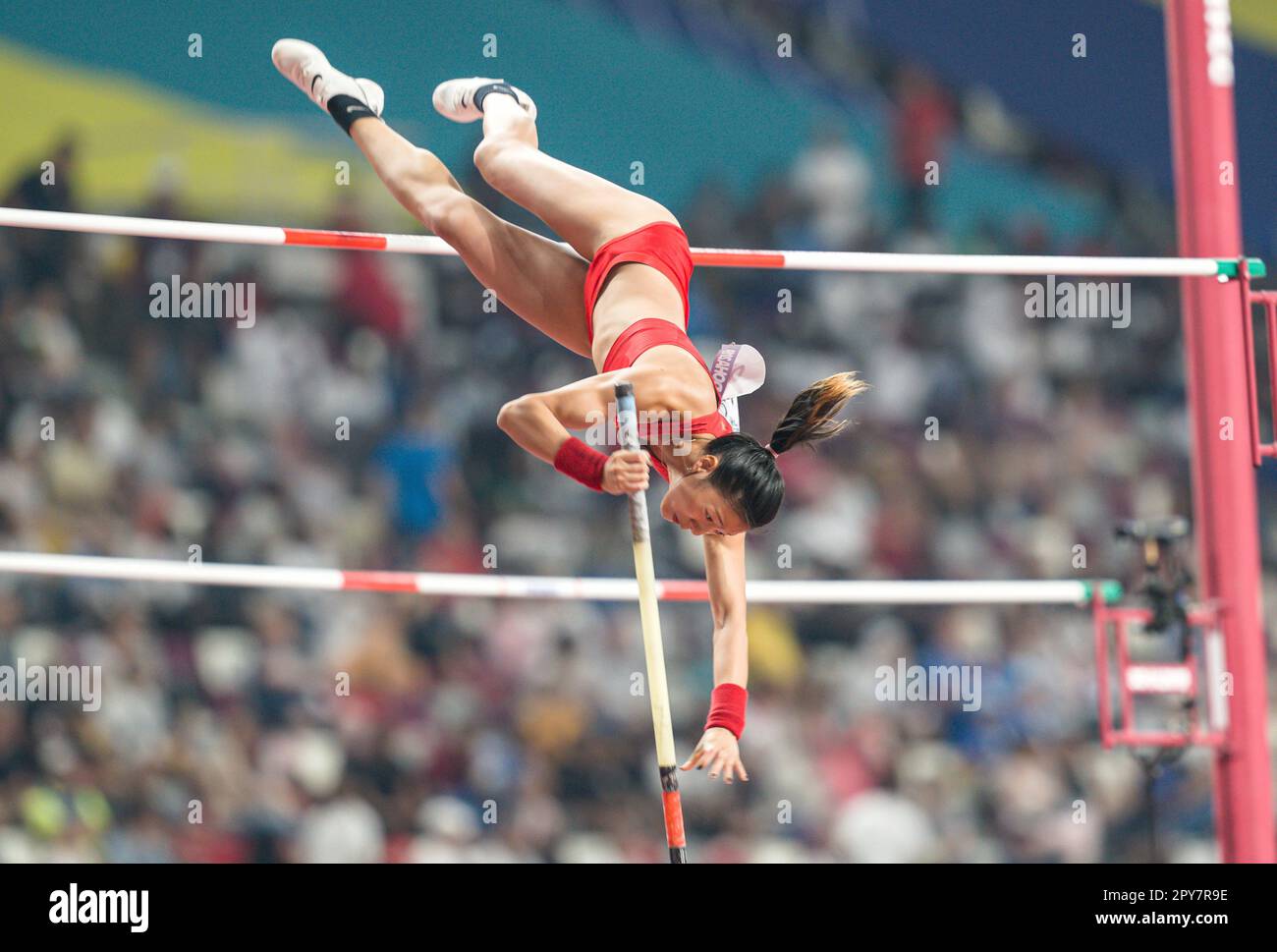 Li Ling participating in the pole vault at the Doha 2019 World ...